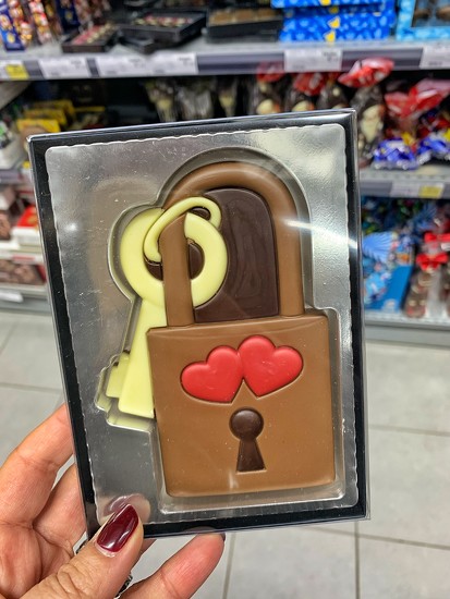 Two tiny red hearts on a chocolate locker. by Corinne · 365 Project