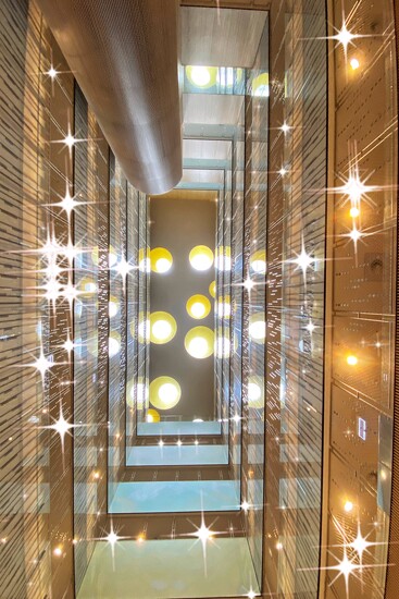 Northern Beaches Hospital atrium from the ground floor looking up. Plus ...