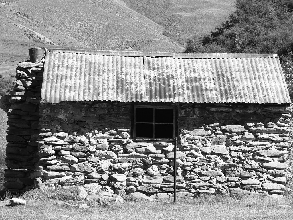 Spotted this stone hut on the Thompson Pass , it is an old gold miners ...