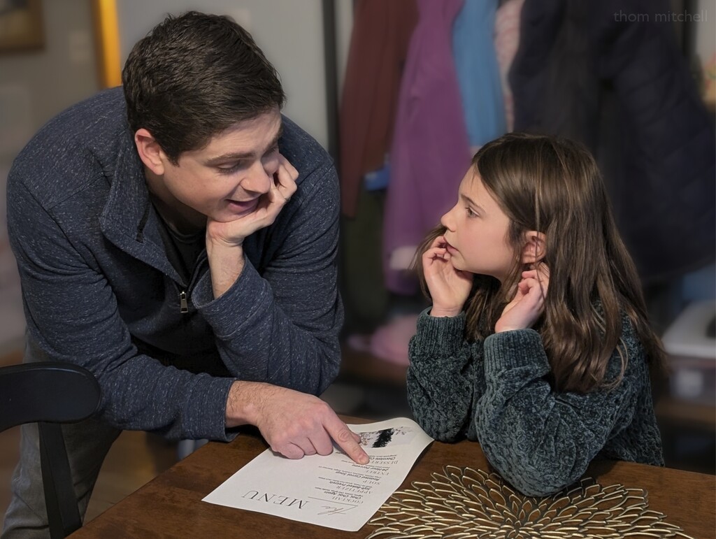 Discussing the Chrismas Eve menu by Thom Mitchell · 365 Project